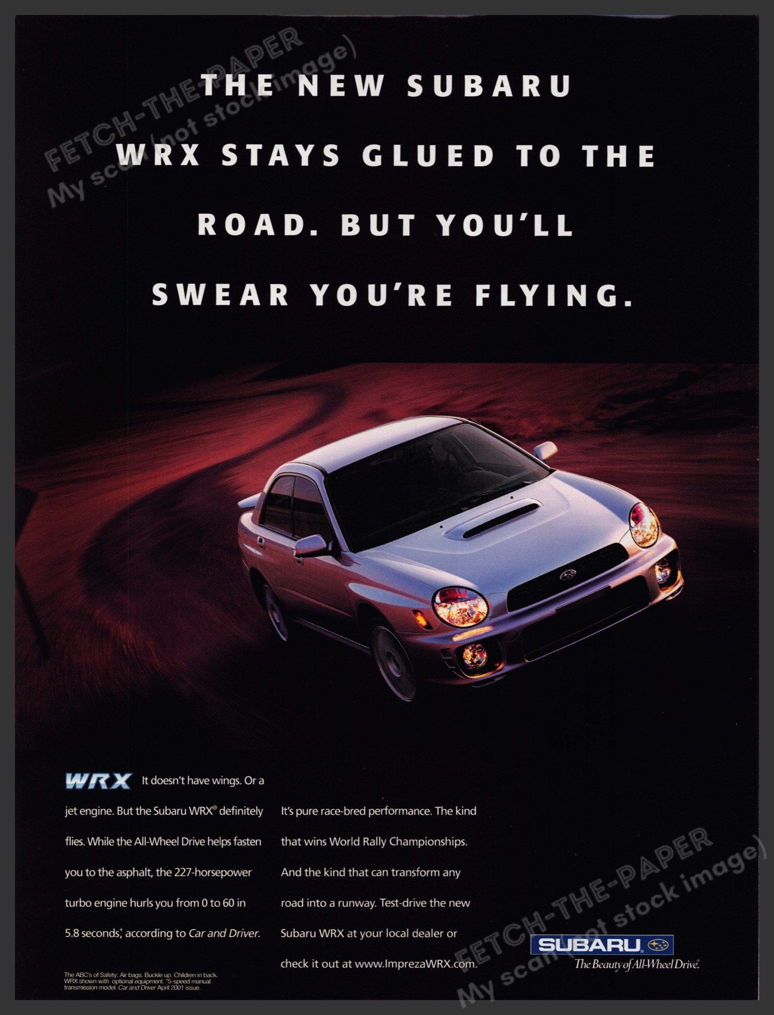 2002 Subaru WRX Print Ad - "Glued to the Road" — Fetch-the-Paper